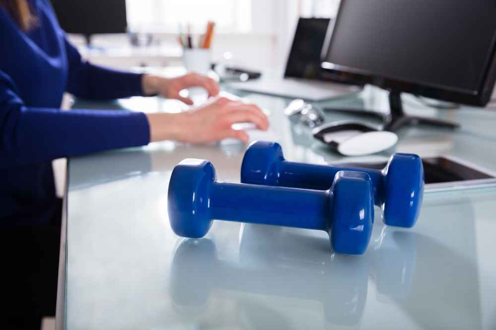 19 Easy Office Exercises For Your Team To Stay Fit & Focused
